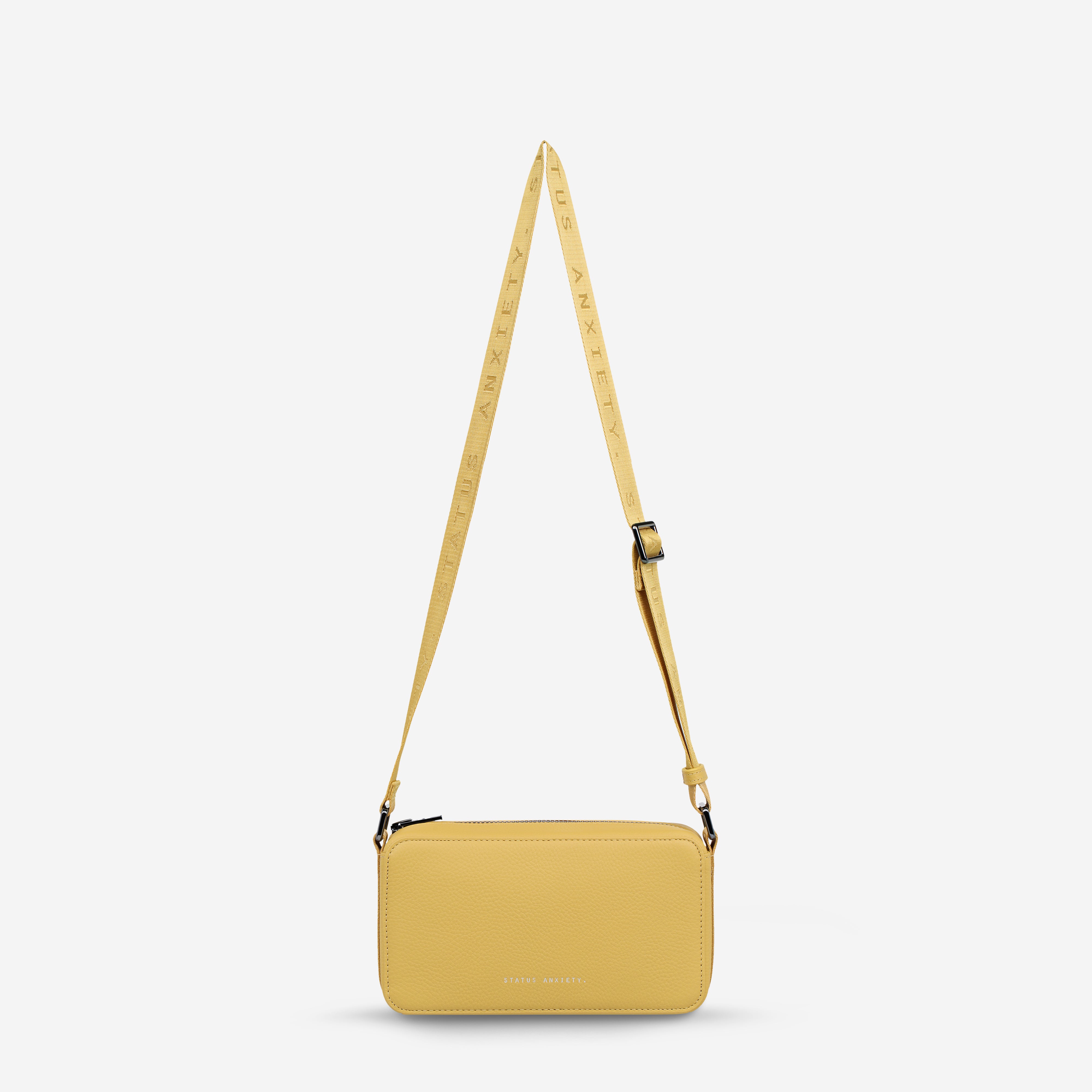 Delirium Women's Buttermilk Leather Crossbody Bag | Status Anxiety®